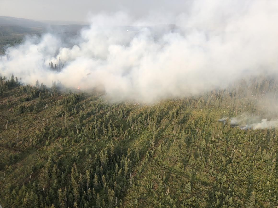 Firefighters aggressively fighting fire near North Fork Road in Anchor ...