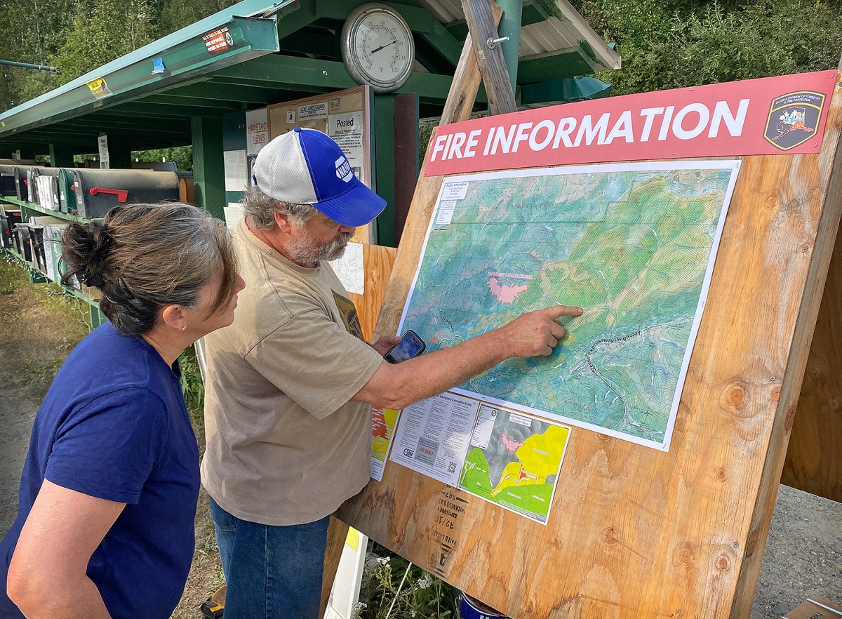 Lost Horse Creek Fire grows to the east behind Haystack Subdivision as ...