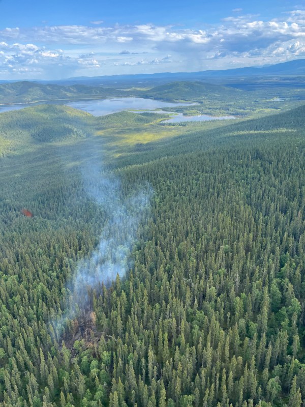 Firefighters working to contain the Glaman Lake Fire (#381) near Tok ...