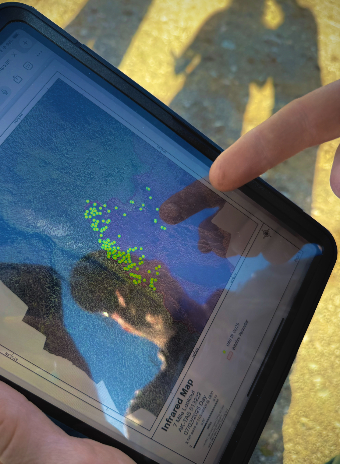 Heat remains under duff, smoke visible on 7 Mile Lookout, Tok River ...